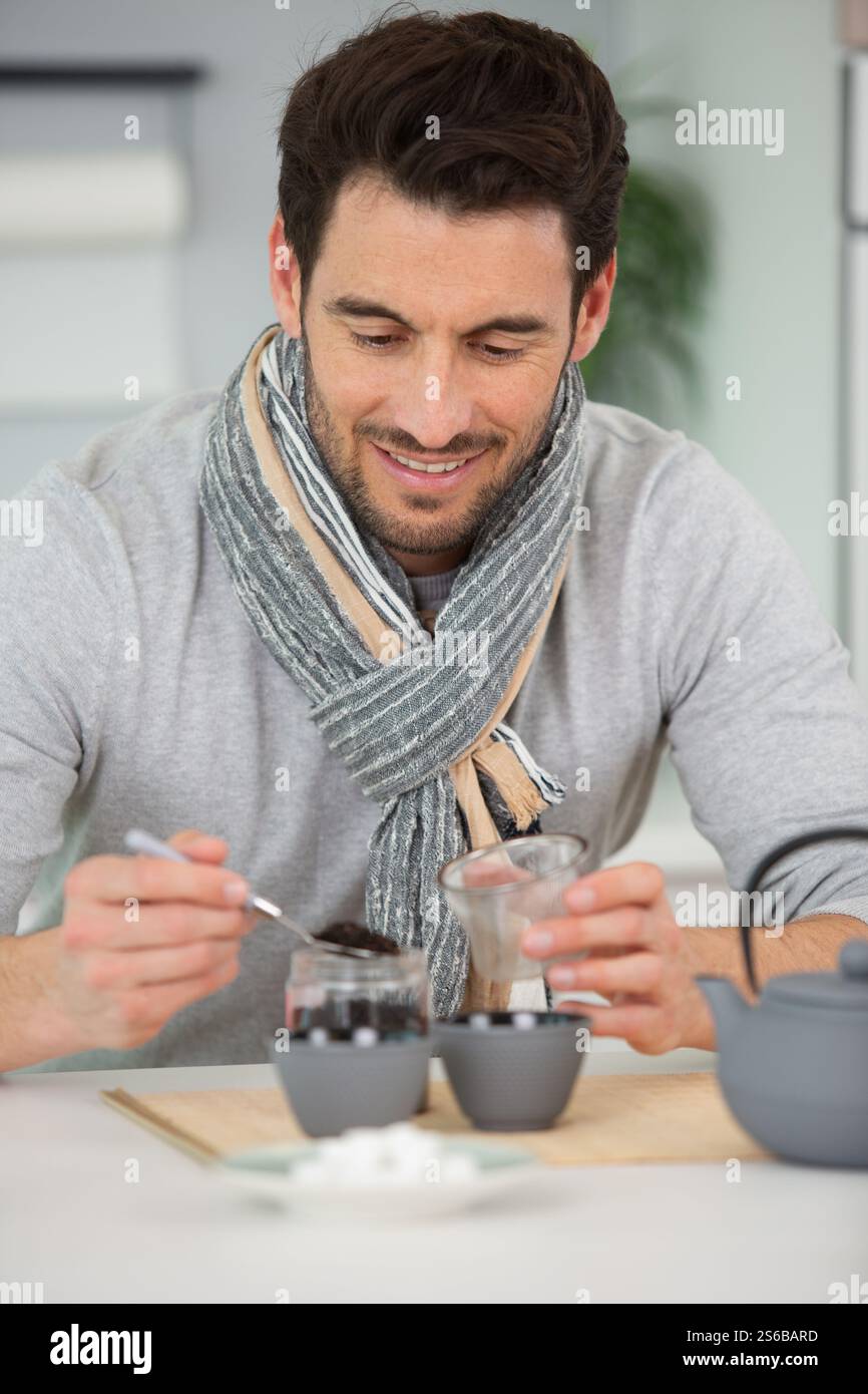 Man making tea at work hi-res stock photography and images - Alamy