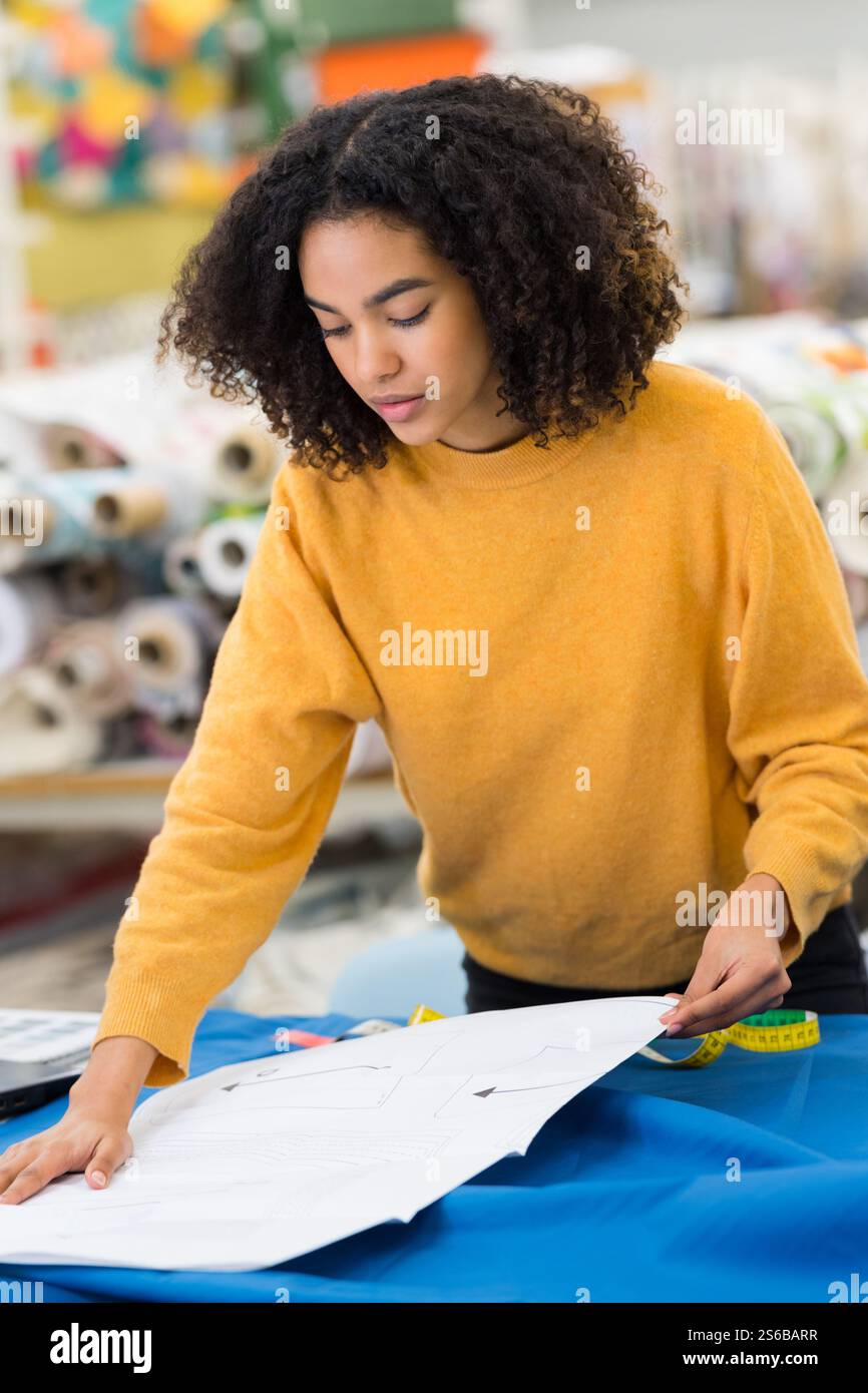 young fashion designer woman checking color palette samples Stock Photo ...