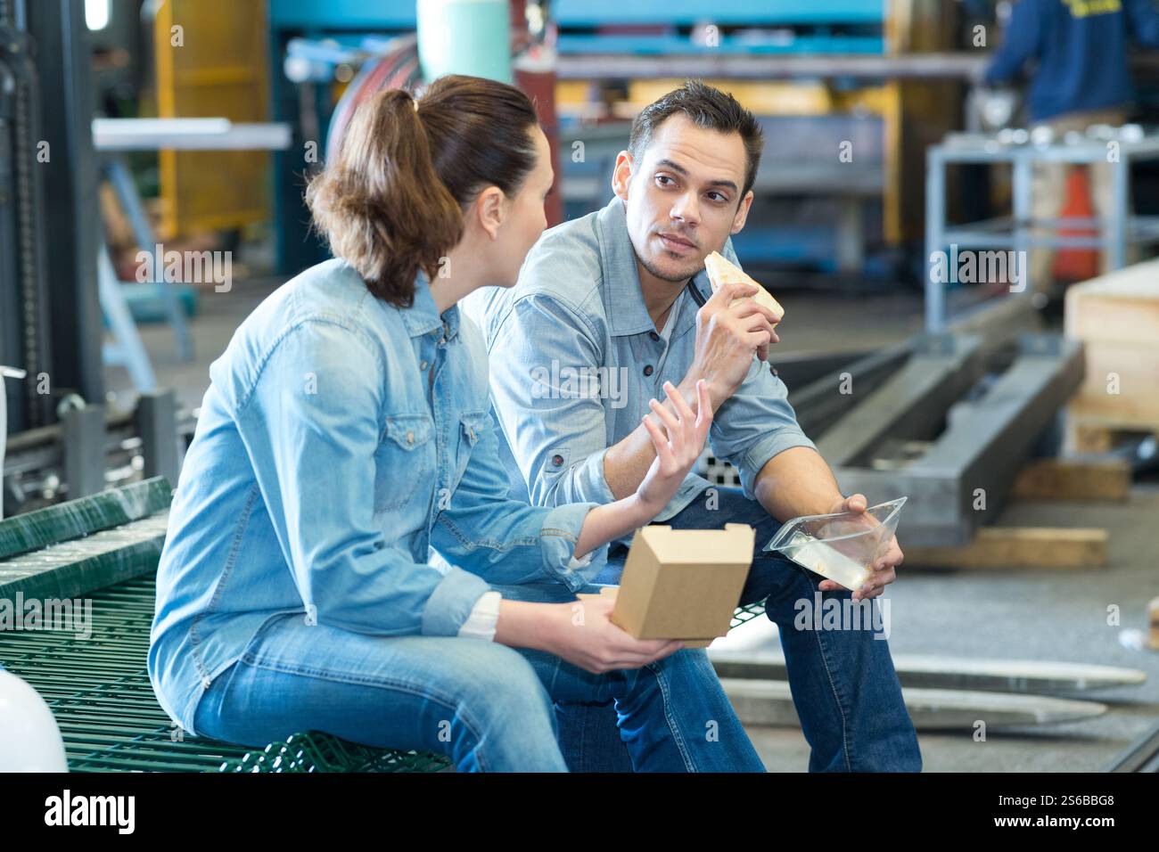 workers having a snack break Stock Photo - Alamy