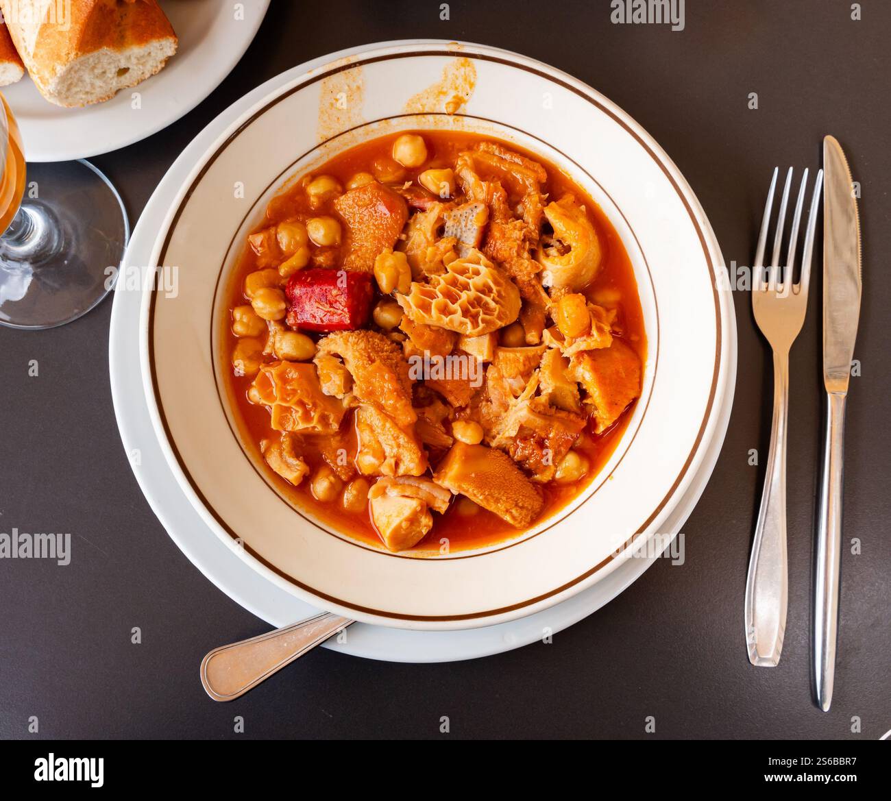 Traditional Spanish dish with chickpeas and meat Stock Photo - Alamy