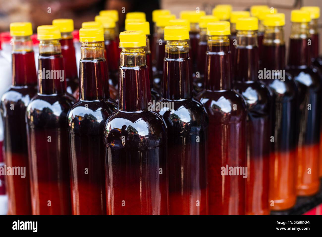 Palm oil in a plastic bottle for sale at a fair. Rich in vitamin A ...