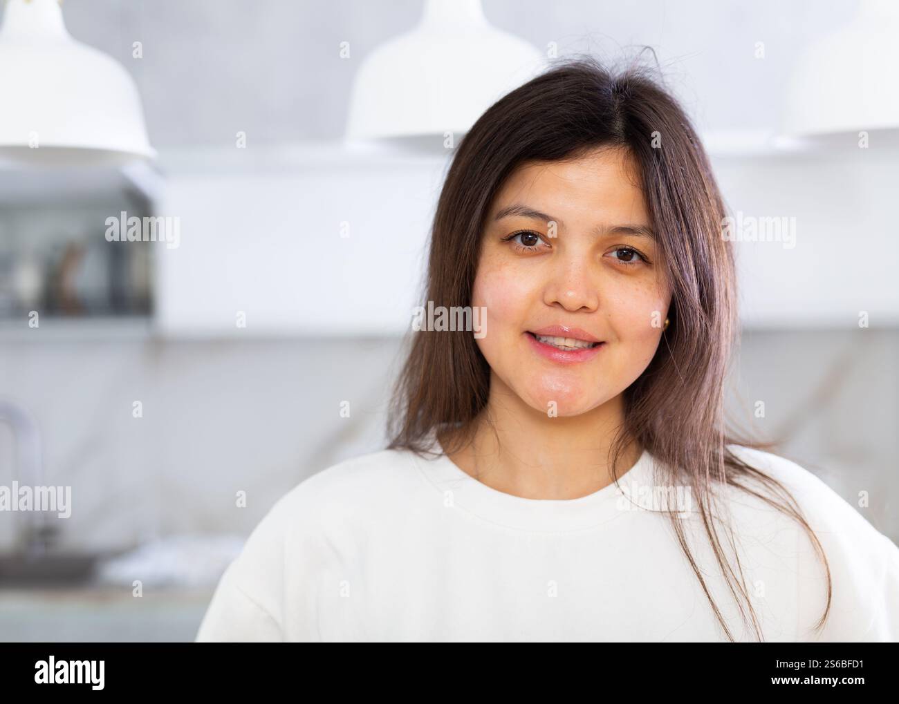 Closeup portrait of pleasant smiling dark-haired young woman Stock ...