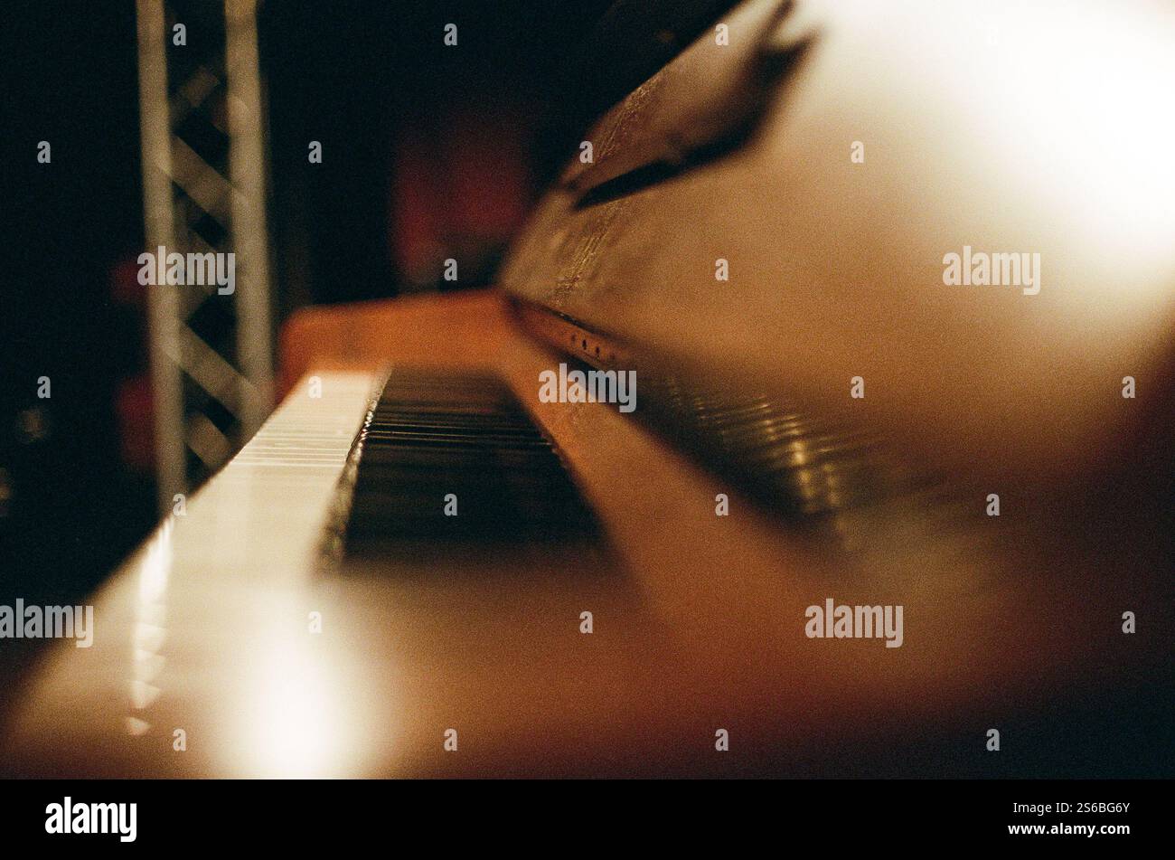 An Upright Piano on stage Stock Photo - Alamy