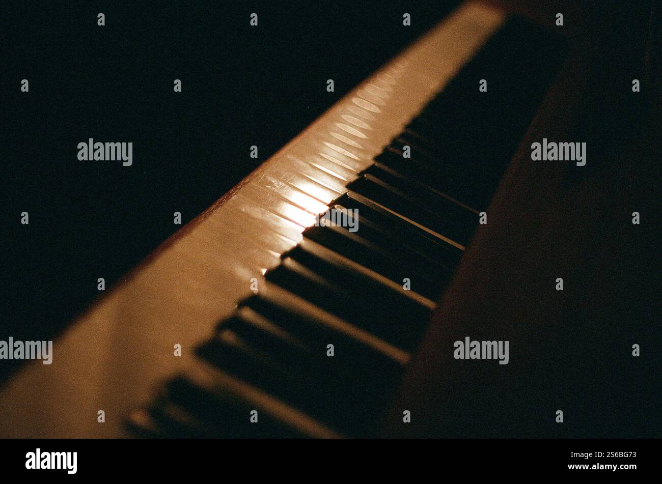 The keyboard of an Upright piano Stock Photo - Alamy