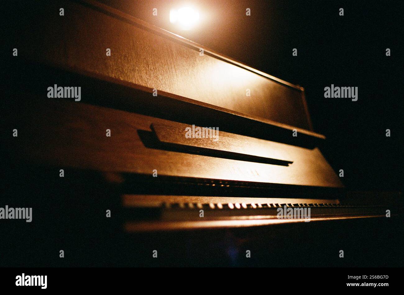 An Upright Piano on stage Stock Photo - Alamy