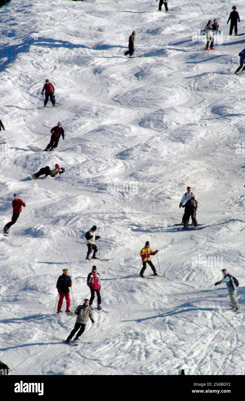 outdoor skiing on a ski slope in the winter vacation skiing on ski ...