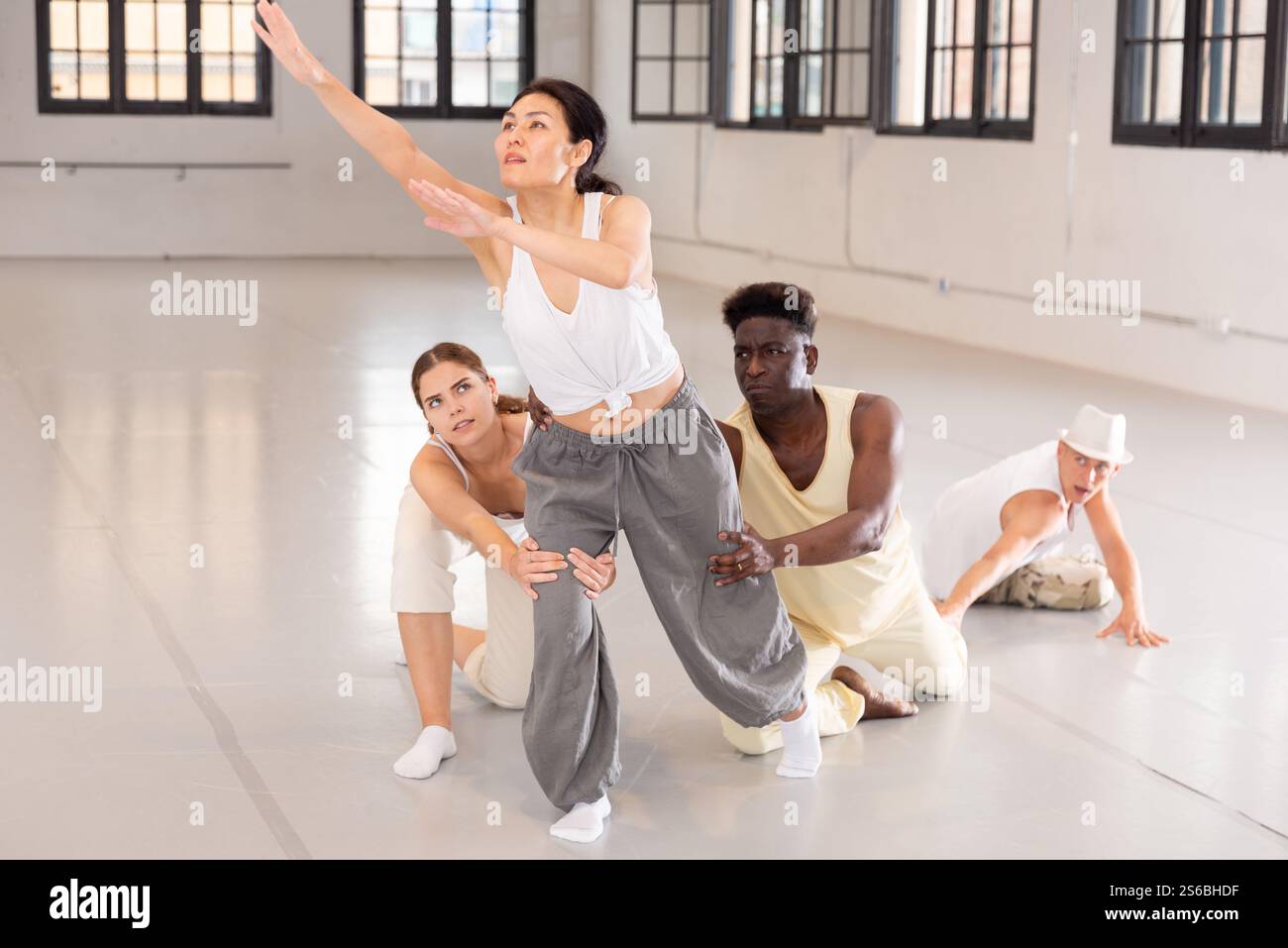 Group of artists rehearsing spectacle scene Stock Photo - Alamy