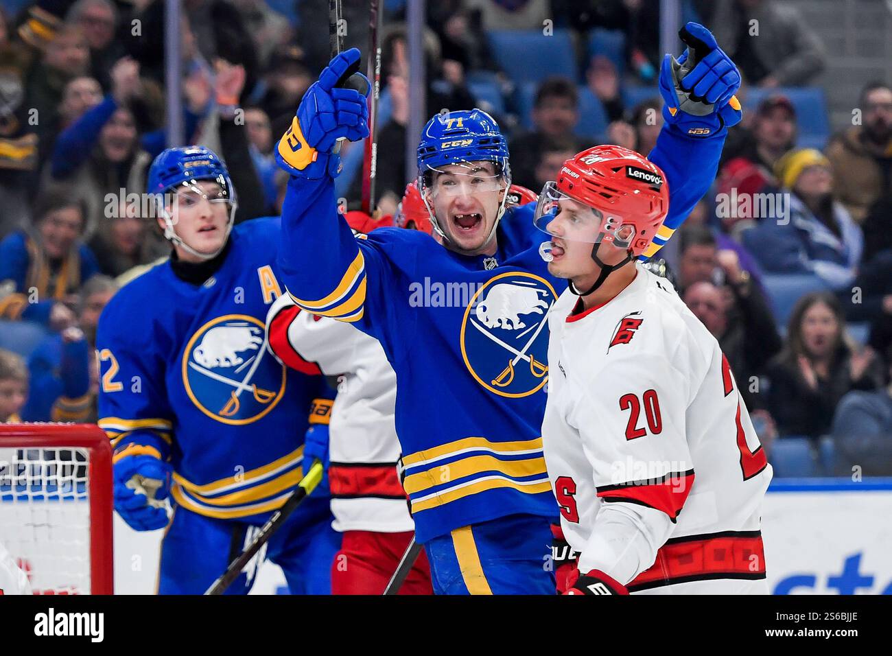 Buffalo Sabres center Ryan McLeod, center, celebrates after scoring as ...