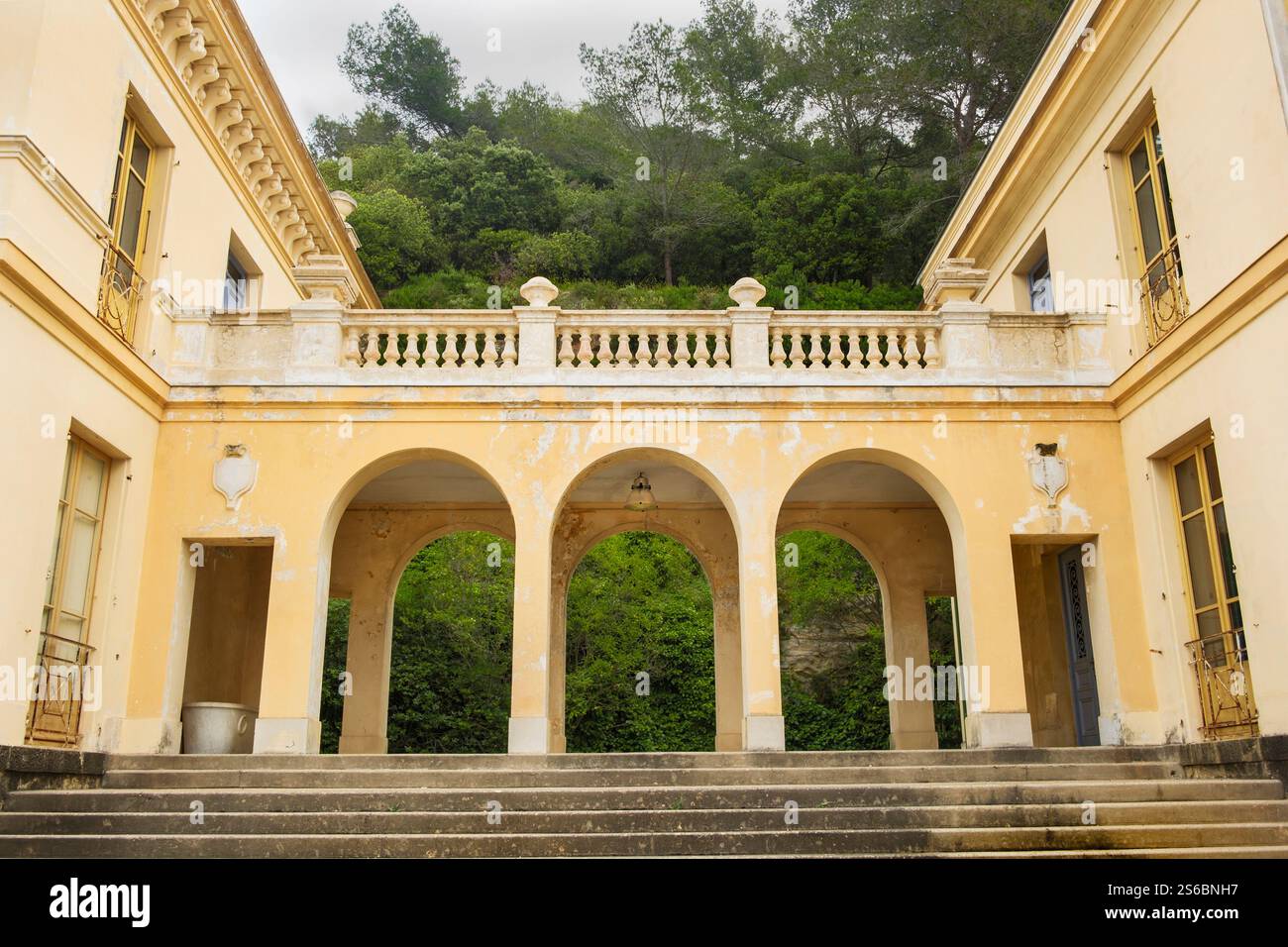 Arched walkway connecting two buildings, Nice, France Stock Photo - Alamy