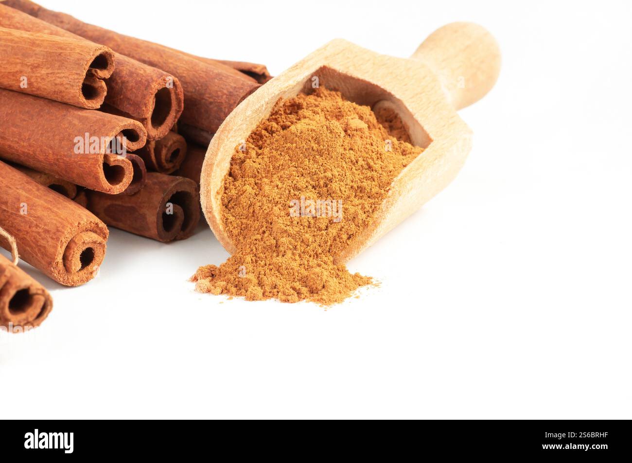 Cinnamon sticks and cinnamon powder isolated on white background ...
