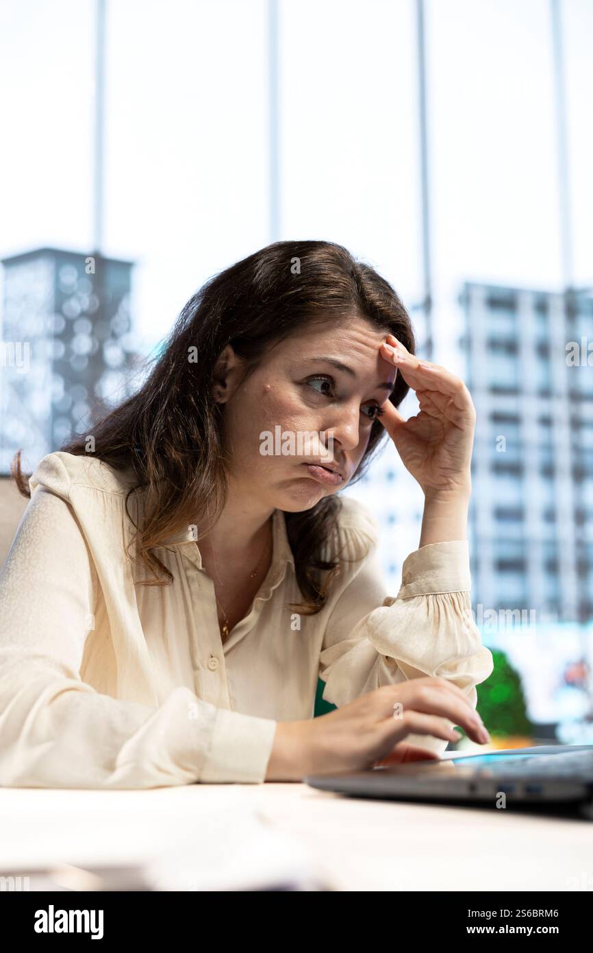 Woman entrepreneur working under pressure and feeling stressed, having ...