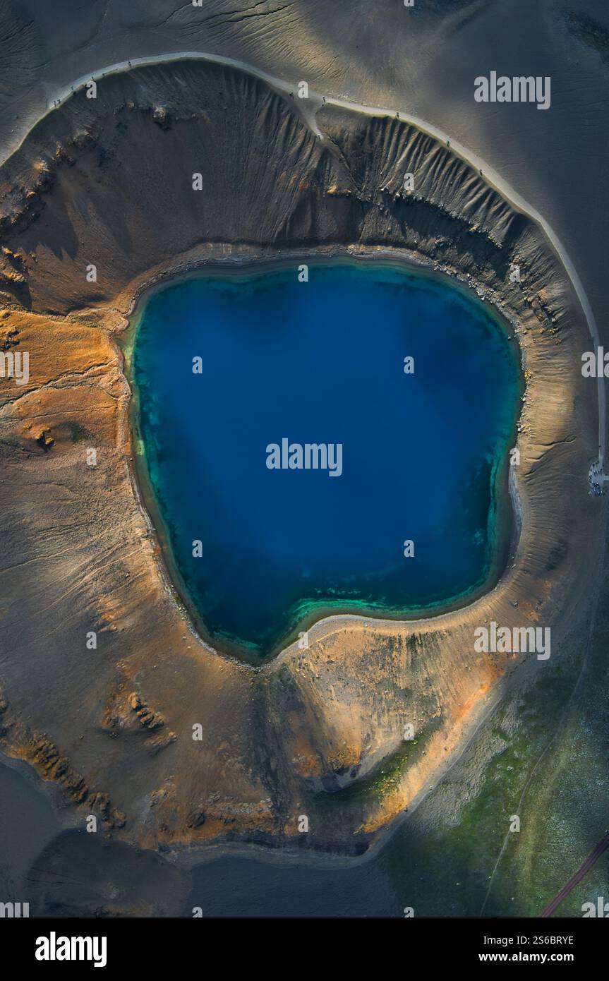 Aerial view of Krafla Crater in Iceland, featuring a vivid blue ...