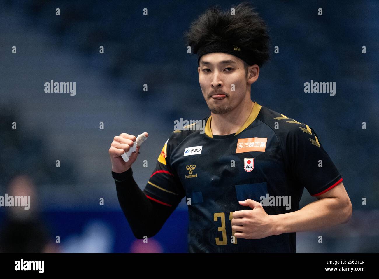 Tatsuki Yoshino of, Japan. , . celebrates during the 2025 IHF World Men ...