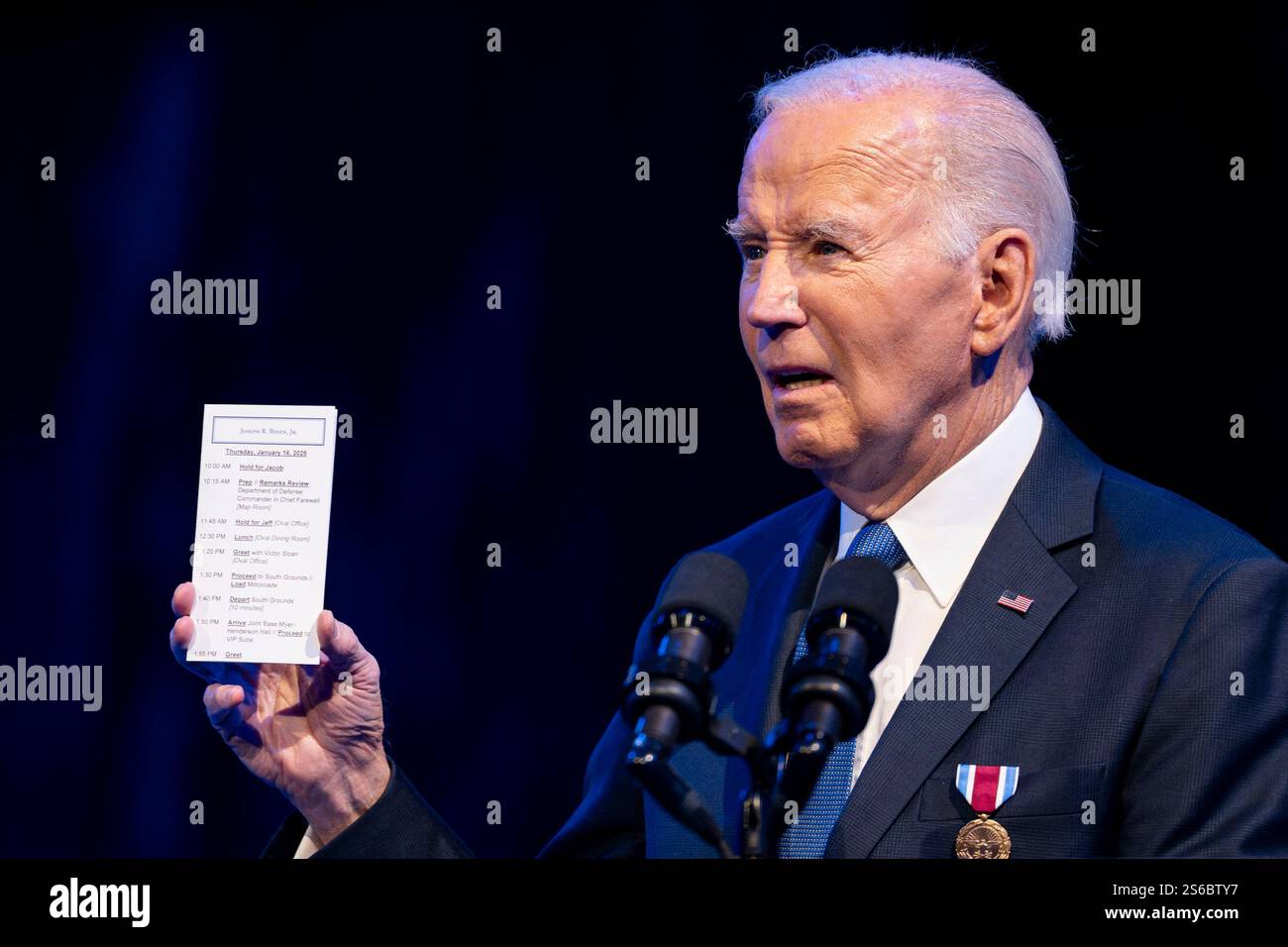 Arlington, United States. 16th Jan, 2025. President Joe Biden holds his ...