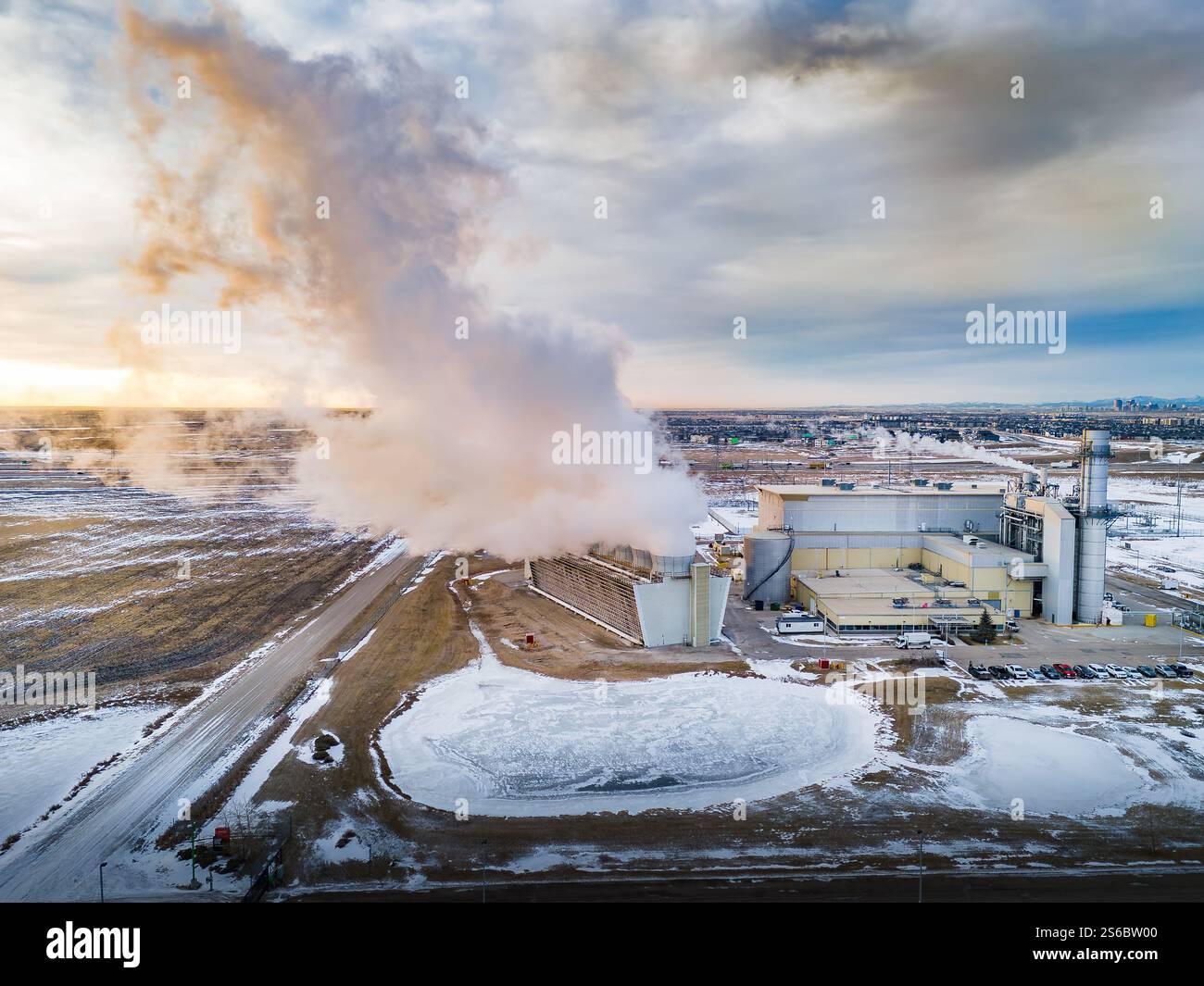 Power generation plant with steam turbines producing electricity during ...
