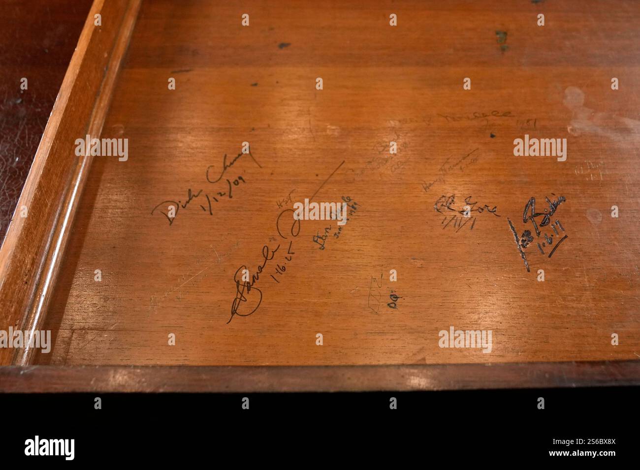 The signature of Vice President Kamala Harris is viewed among other ...