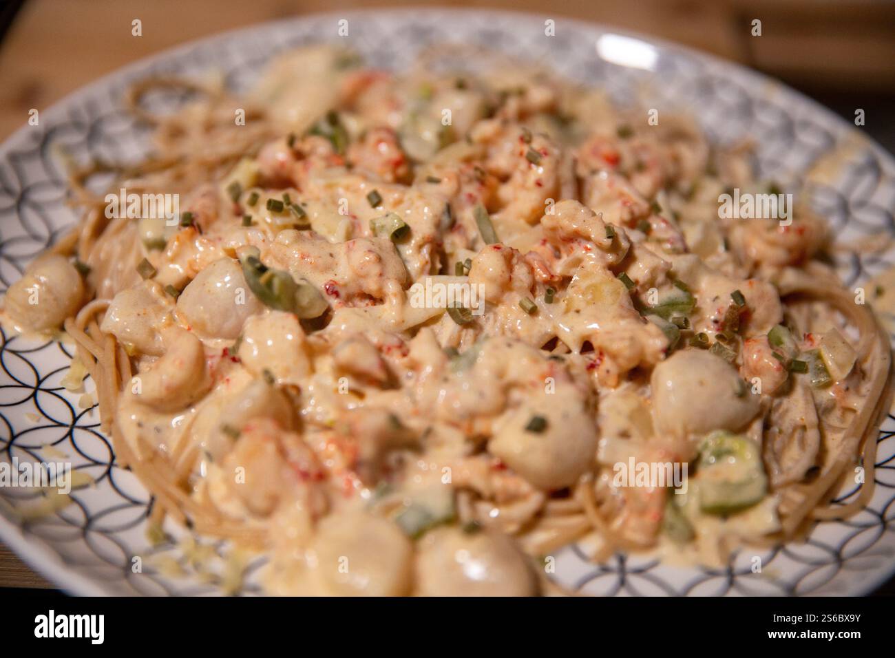 Cajun Creamy Crawfish Pasta Plated Stock Photo - Alamy