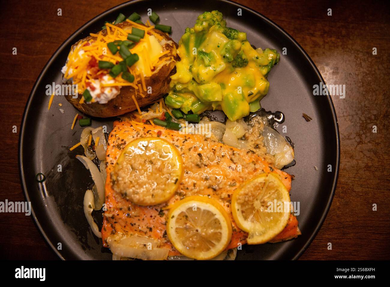 Baked Steelhead trout with sides Stock Photo - Alamy