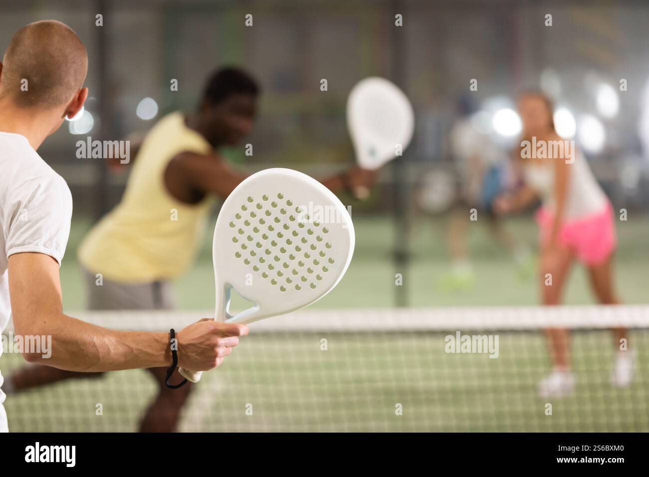 Padel tennis couple in court ready for play Stock Photo - Alamy