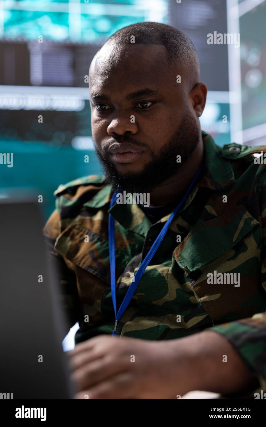 Secret service officer in a modern army headquarters manages ...