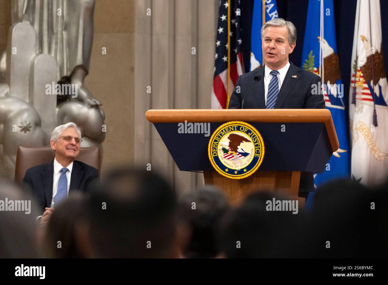 FBI Director Christopher Wray speaks during a farewell ceremony for ...