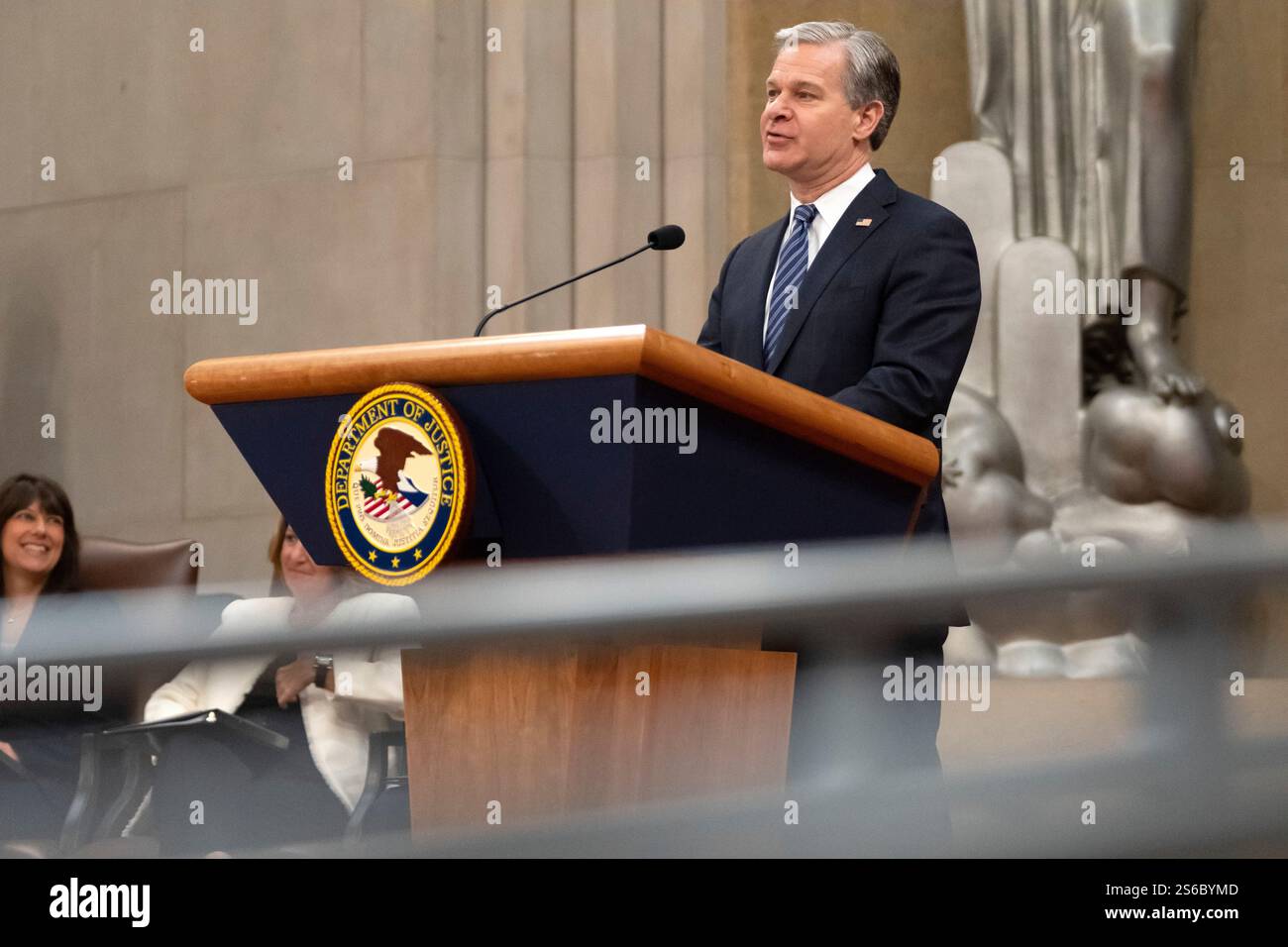 FBI Director Christopher Wray speaks during a farewell ceremony for ...