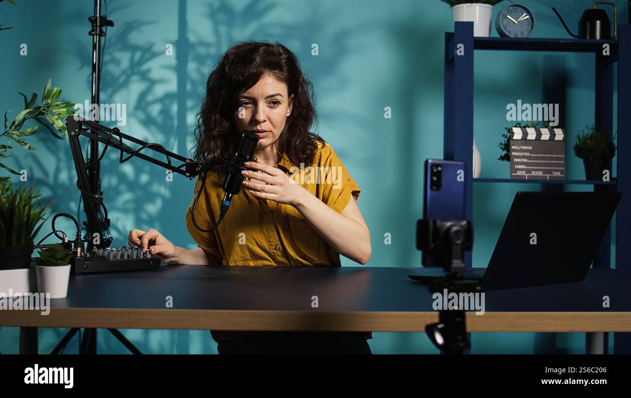 Content creator doing relaxing ASMR type of video for fans, filming in ...