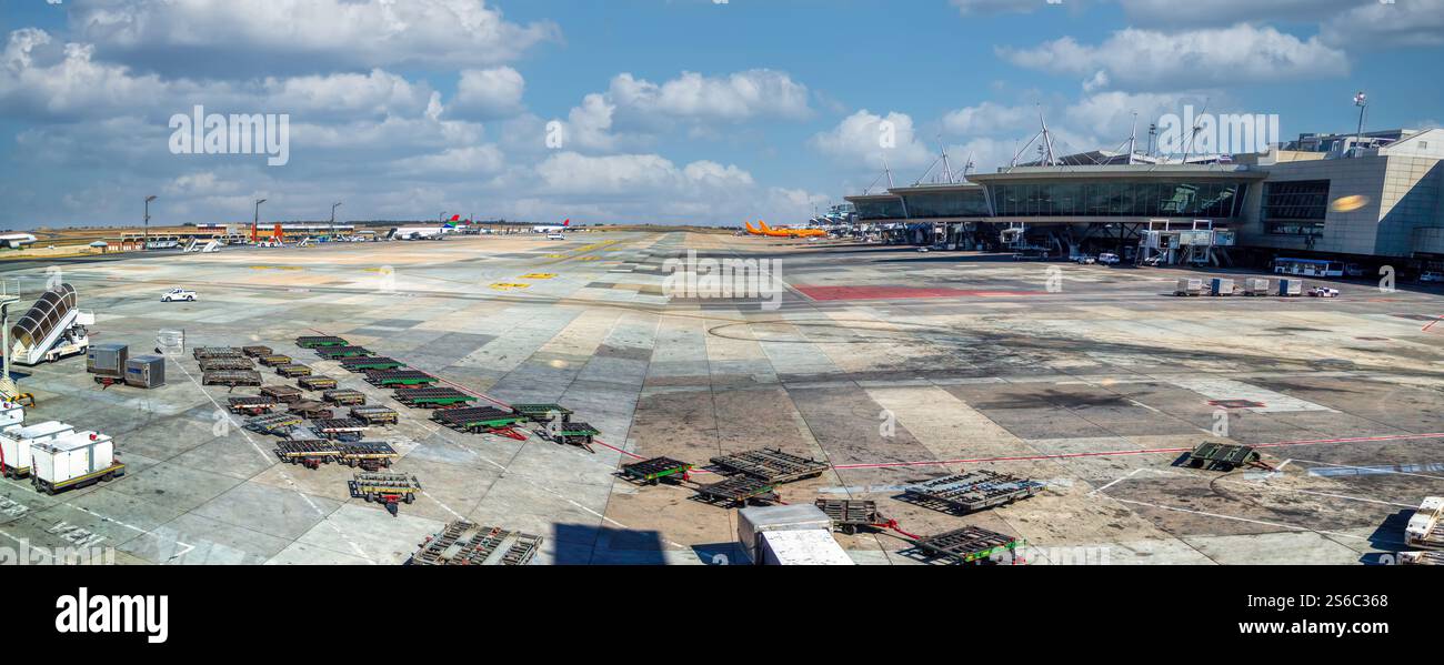 airport cargo terminal , containers and carts prepared to load Stock ...