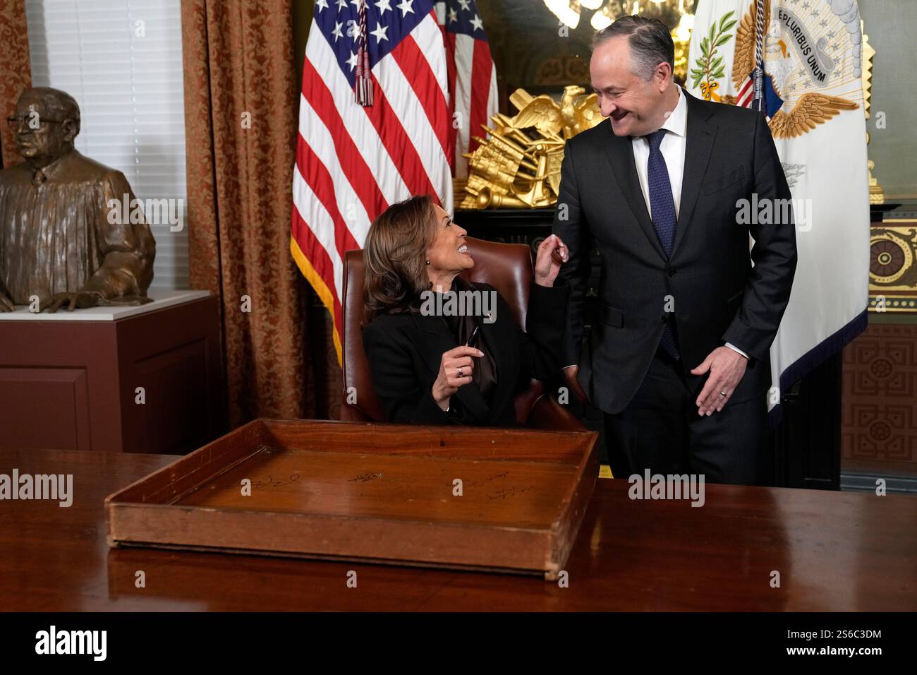 Vice President Kamala Harris, left, looks at second gentleman Doug ...