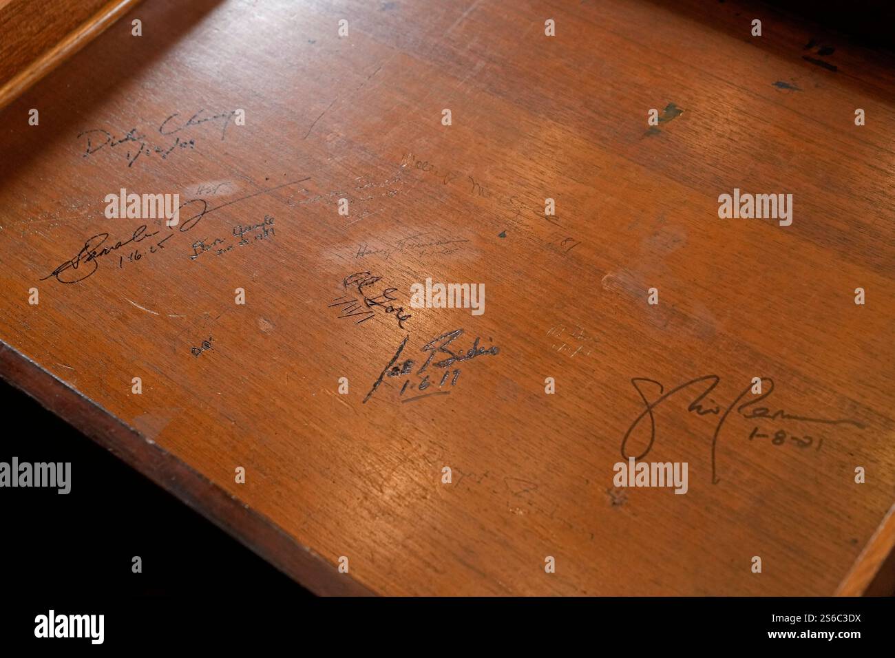 The signature of Vice President Kamala Harris is viewed among other ...