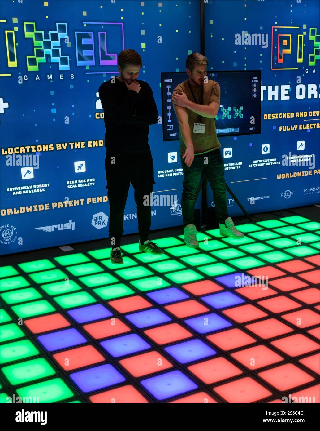 Man competing on a gaming floor at the EAG Expo Europe 2025 exhibition ...