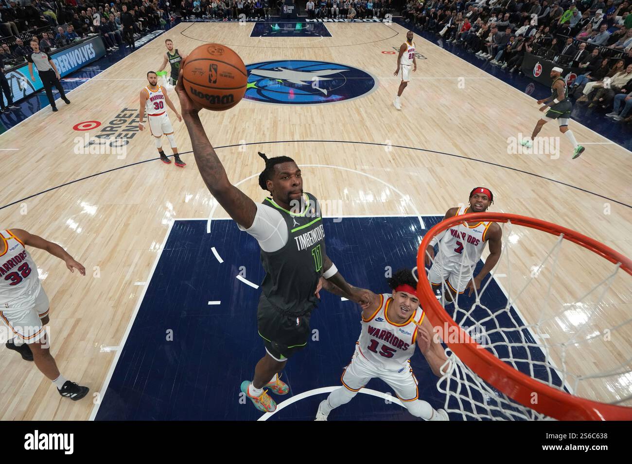 Minnesota Timberwolves center Naz Reid (11) goes up for a dunk as ...