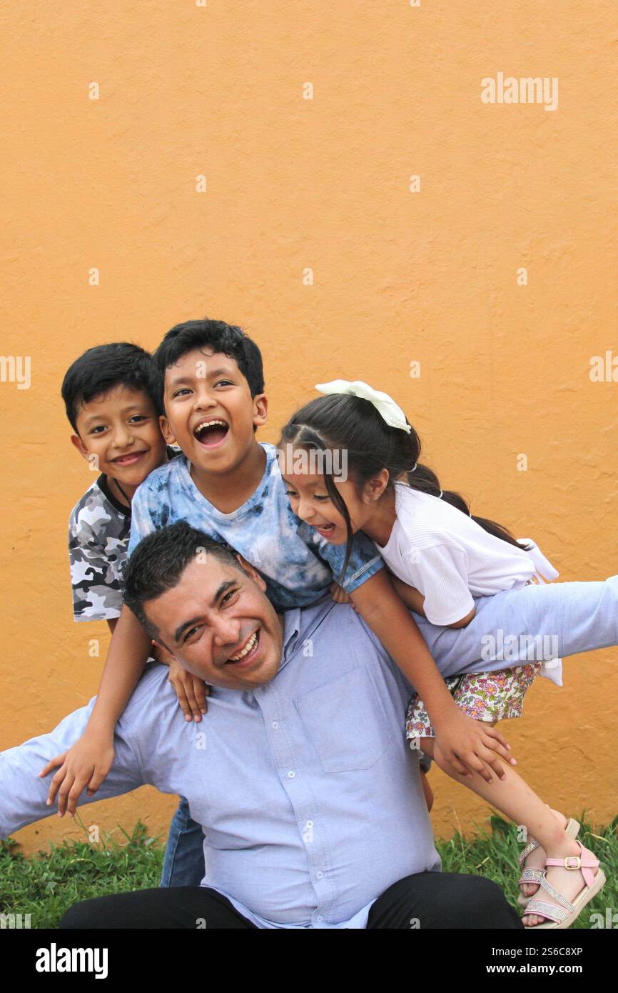 Single Dad with two brown latino sons and daughter spend time together ...