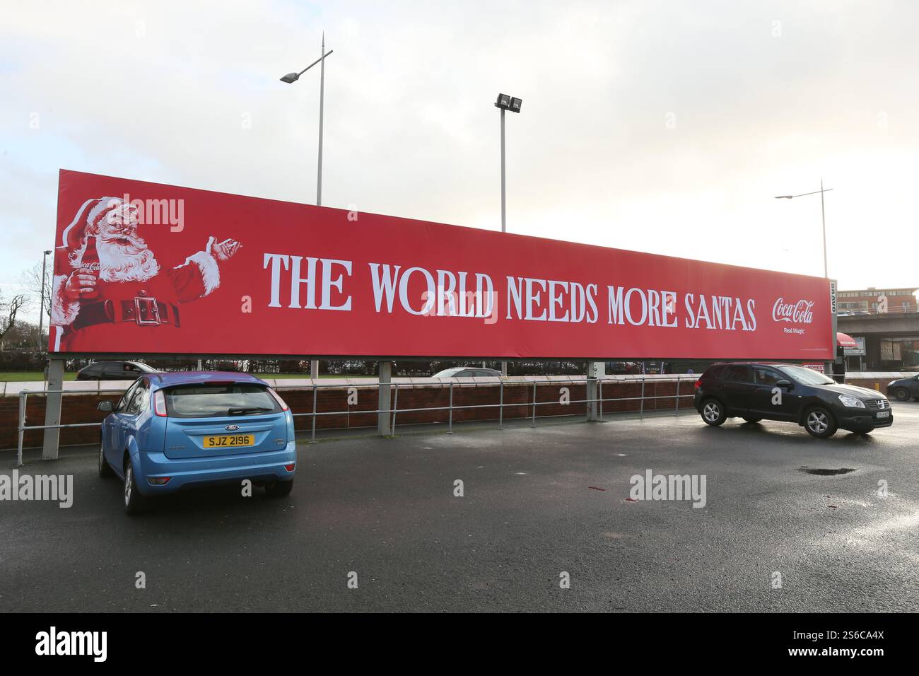 Belfast, Northern Ireland - December 2024 - A large Coca Cola sign with ...