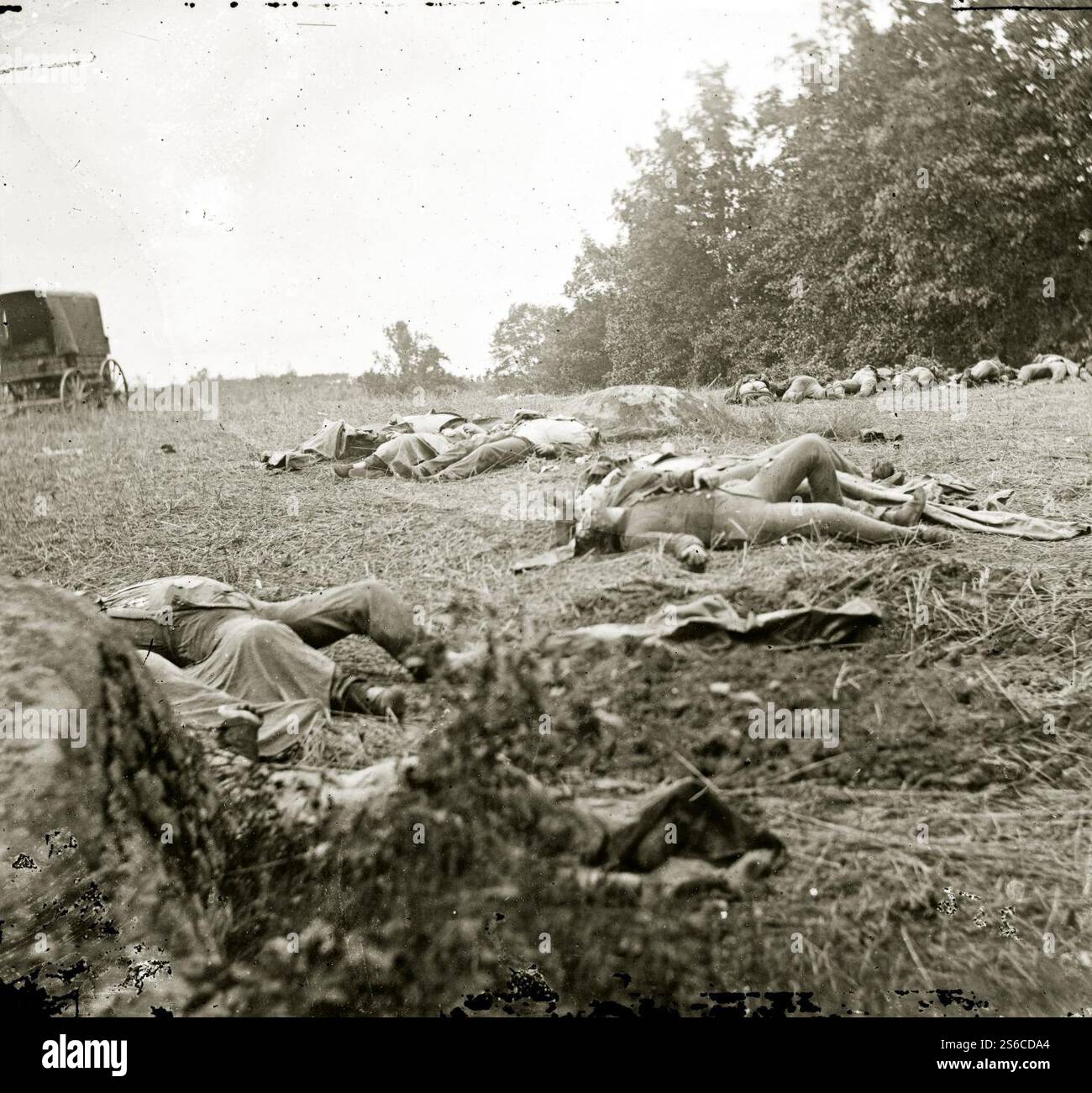 Gettysburg, Pa. Confederate dead gathered for burial at the edge of the ...