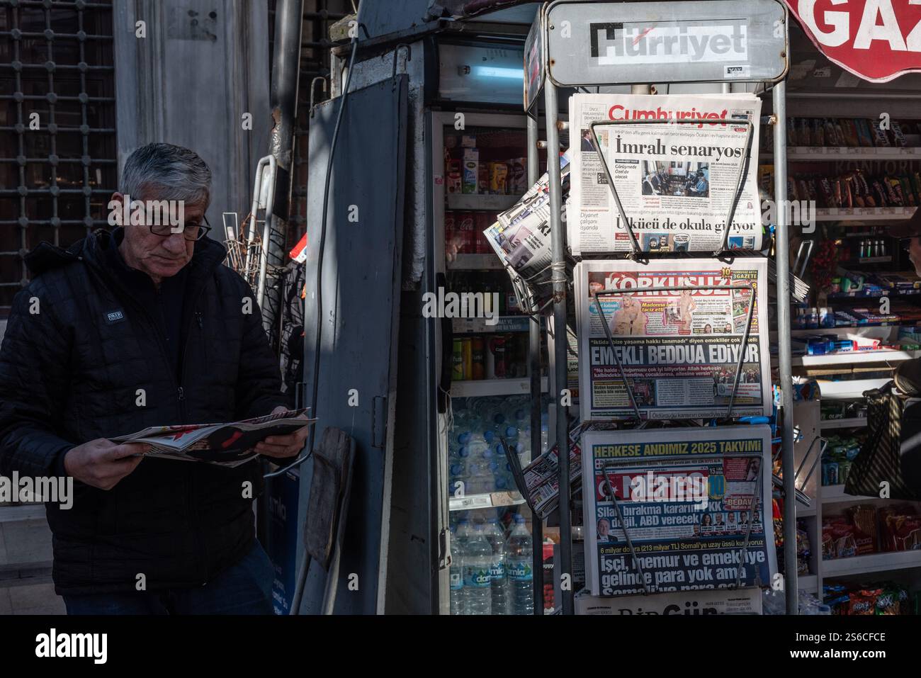 Istanbul, Turkey. January 7th 2025. A Turkish man reads a newspaper ...