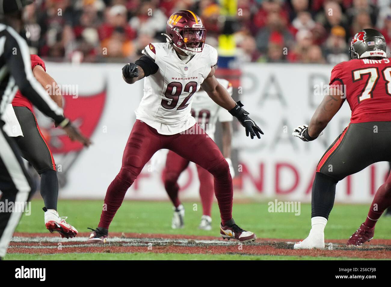 Washington Commanders defensive tackle Jonathan Allen (93) directs a ...