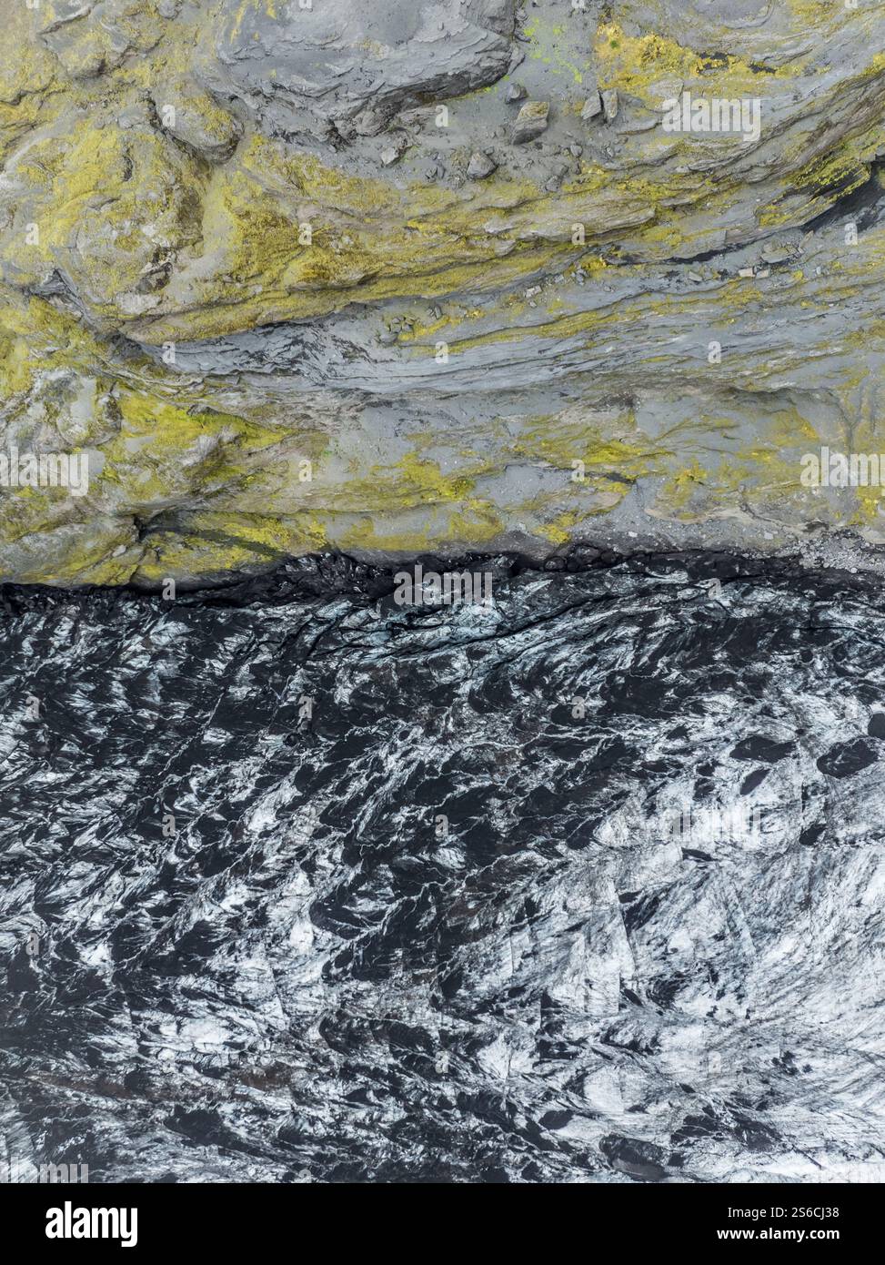 A glimpse of nature’s timeline, glacier remnants meet exposed rock ...