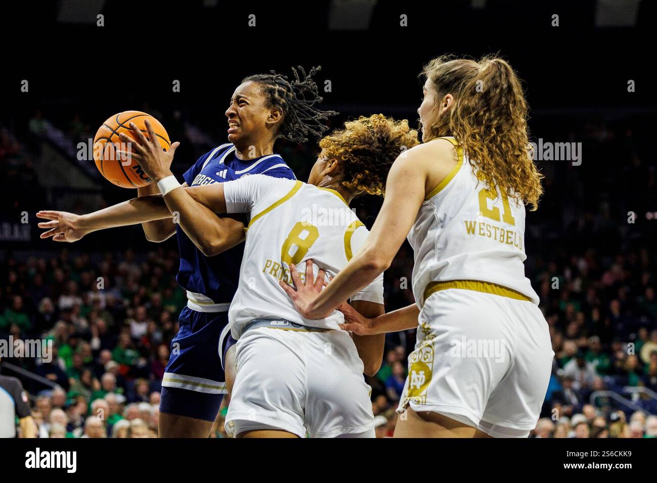 Georgia Tech guard Tonie Morgan, left, drives to the basket as Notre ...