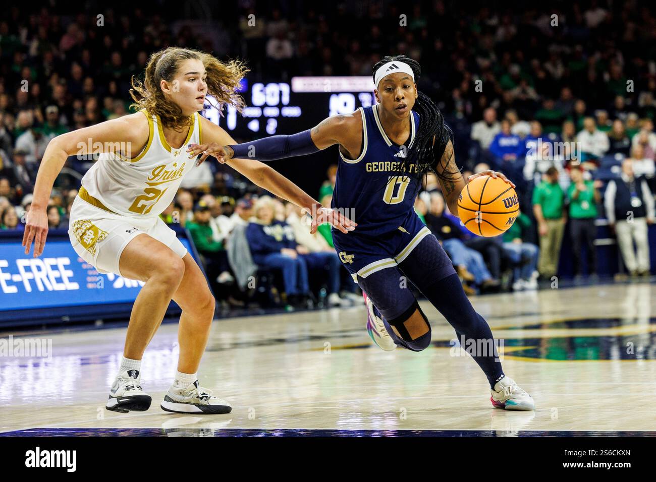 Georgia Tech guard Zoesha Smith (0) drives to the basket as Notre Dame forward Maddy Westbeld ...
