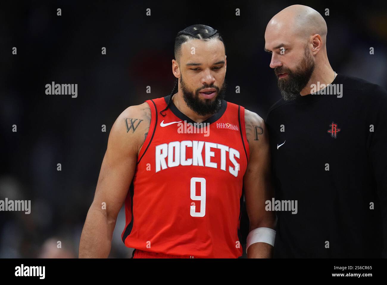 Houston Rockets forward Dillon Brooks (9) confers with Houston Rockets ...