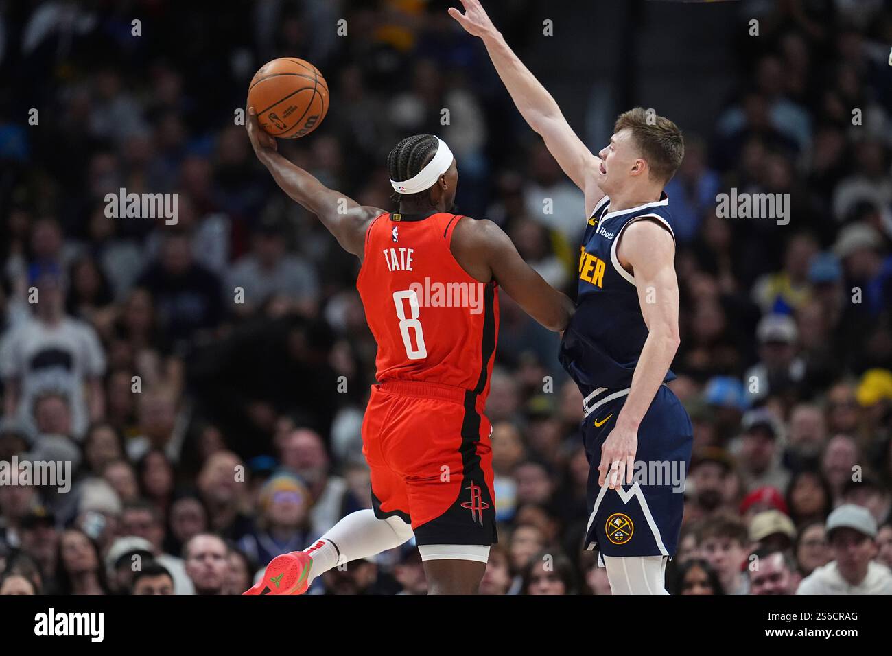 Houston Rockets forward Jae'Sean Tate (8) and Denver Nuggets guard ...