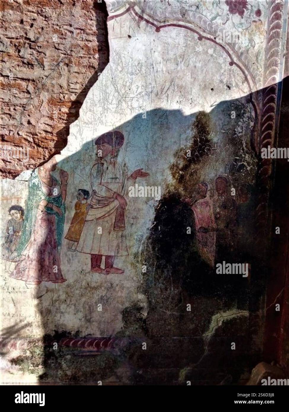 Fresco depicting a scene of men, women, and children from Mansar Haveli ...