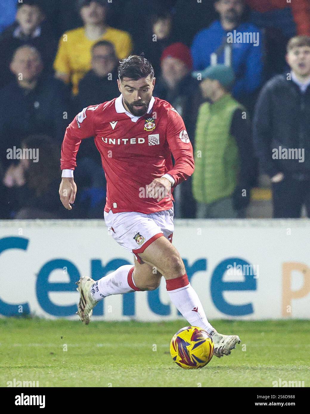#38, Elliot Lee of Wrexham in action with the ball during the Sky Bet ...