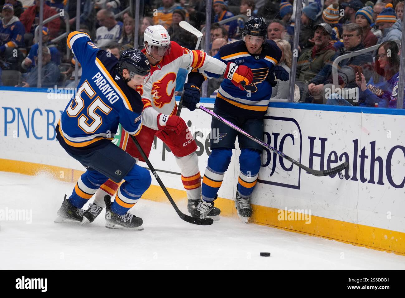 Calgary Flames' Martin Pospisil (76) battles for a loose puck with St ...
