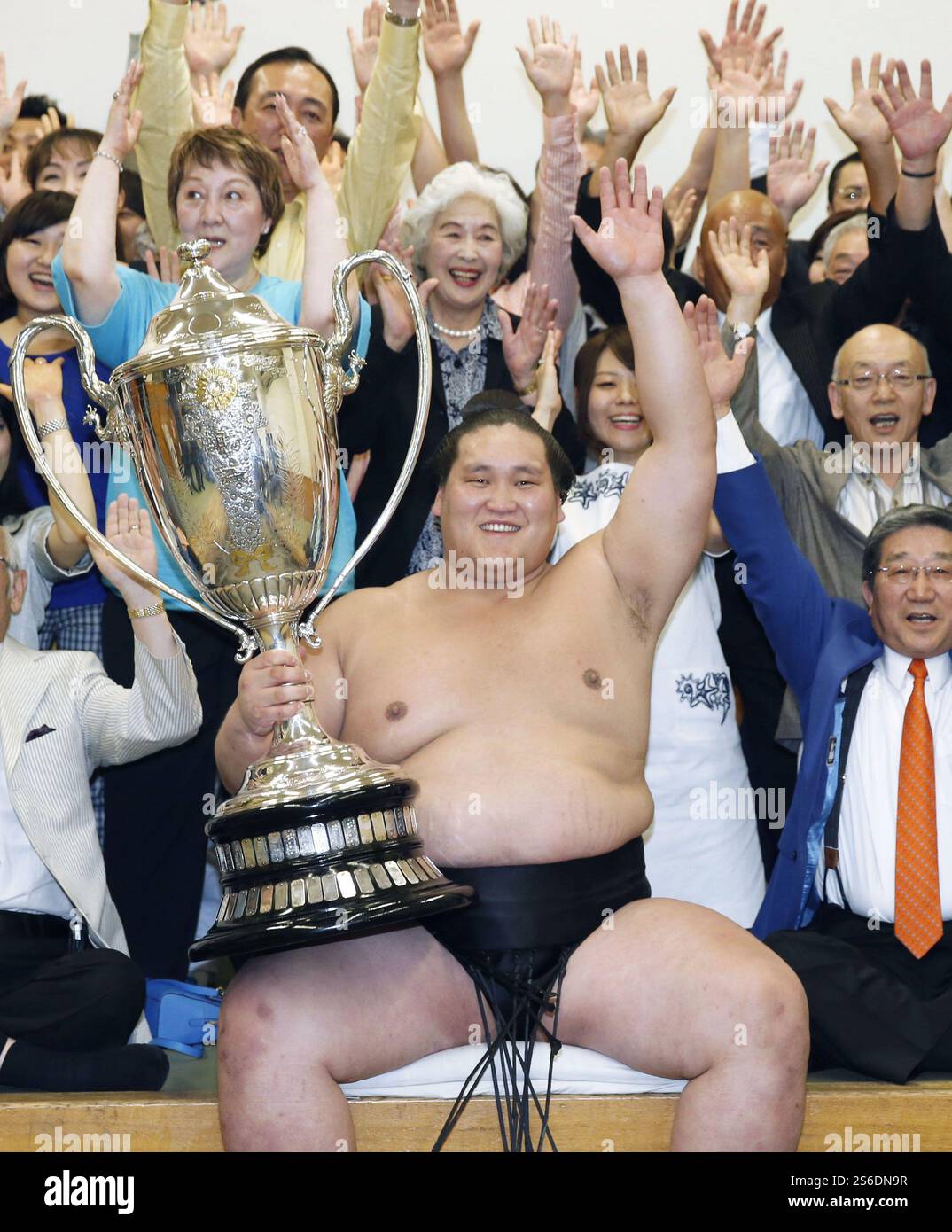 Photo taken on May 24, 2015, shows sekiwake Terunofuji from Mongolia celebrating with his ...