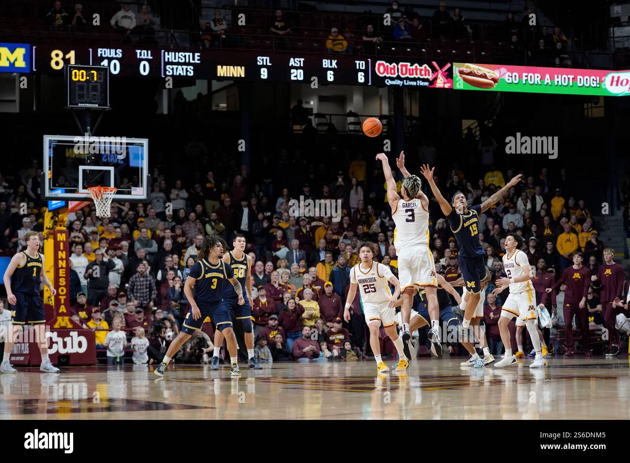 Minnesota forward Dawson Garcia (3) shoots and scores the winning 3 ...