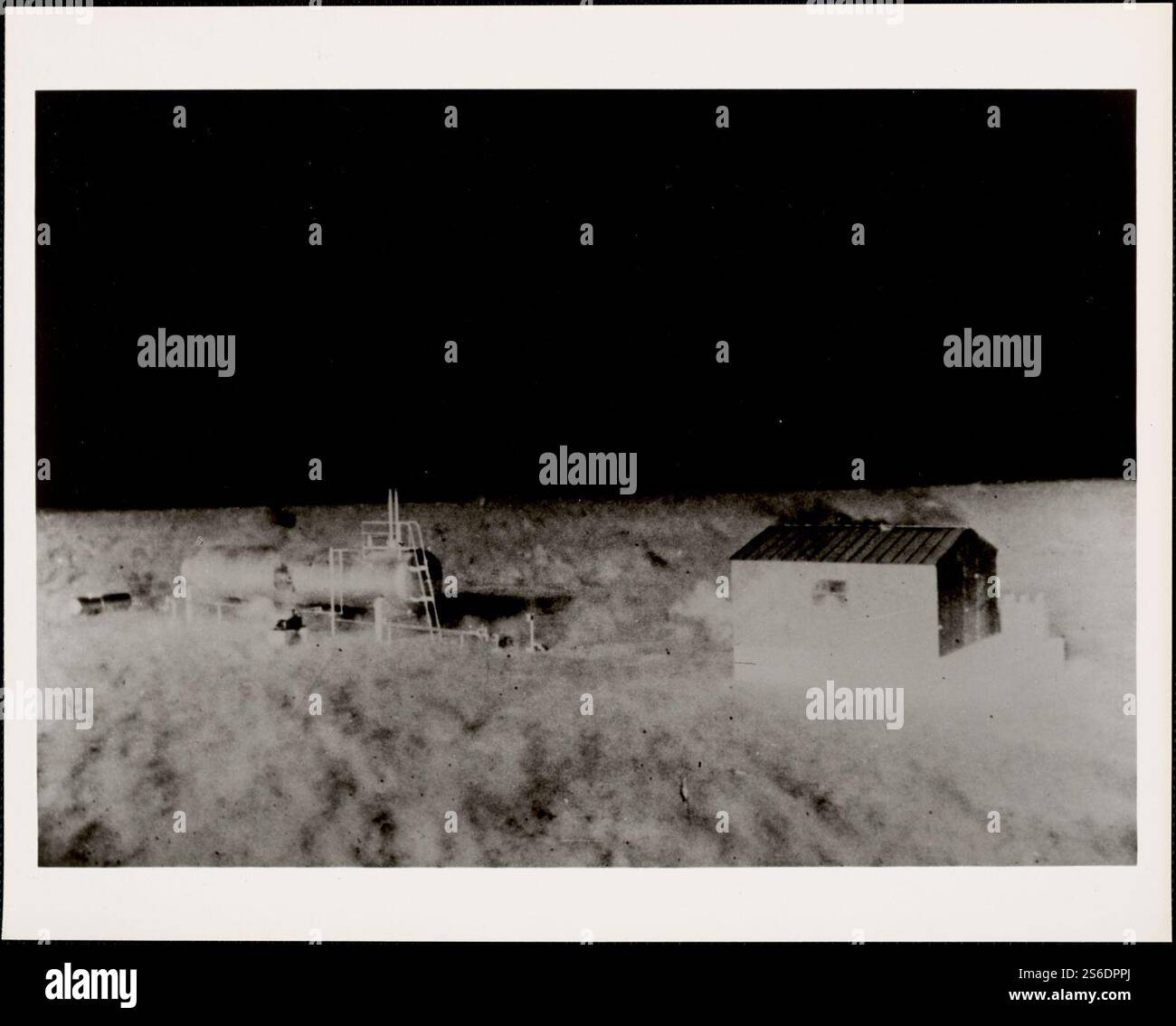 Gas pump house smolders, Welfare photos of Operation Cue Atomic ...