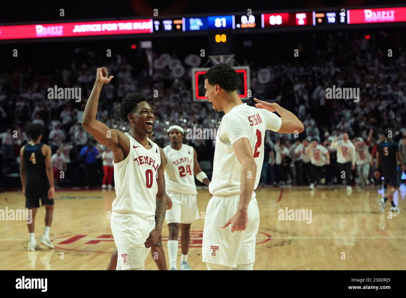Temple's Quante Berry (0) and Steve Settle III (2) celebrate after ...