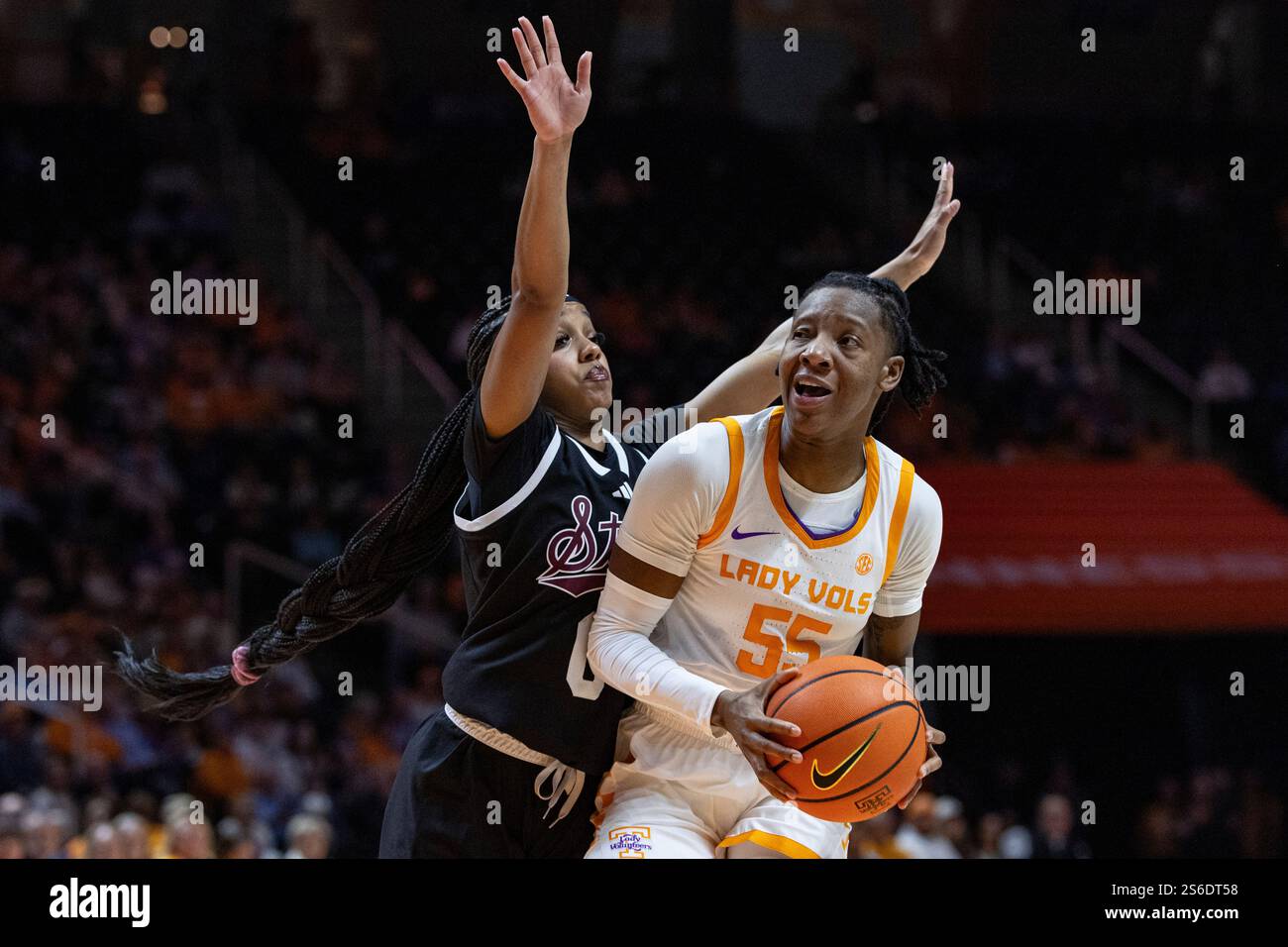 Tennessee guard Talaysia Cooper (55) drives for a shot as she's dfended by Mississippi State ...
